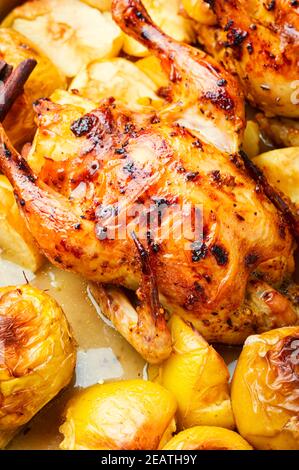 Baked partridge with apple Stock Photo - Alamy