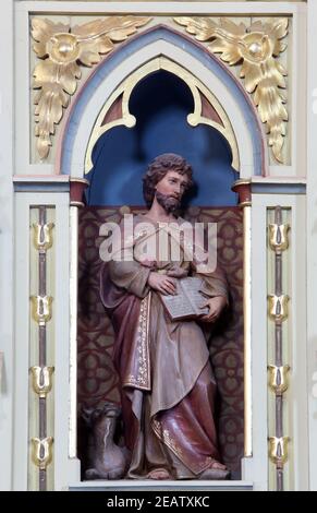 Saint Luke, a statue on the pulpit in the parish church of Saint ...
