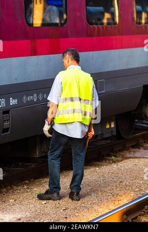 Train crew man doing checkings on the platform at the Bucharest North ...
