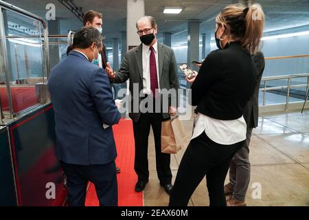 Sen. Mike Braun, R-Ind., speaks with reporters in subway of Capitol ...