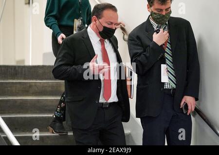 Sen. Mike Lee, R-Utah, leaves the chamber, at the Capitol in Washington ...