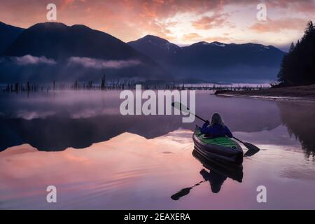 Adventurous Girl kayaking on an infatable kayak Stock Photo - Alamy