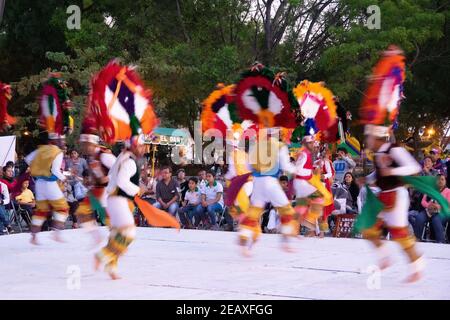 A group of dancers put on an exhibition showcasing various Indigenous ...