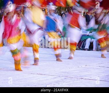 A group of dancers put on an exhibition showcasing various Indigenous ...