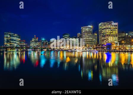 An evening view of the city of Sydney and Darling Harbour with lights ...