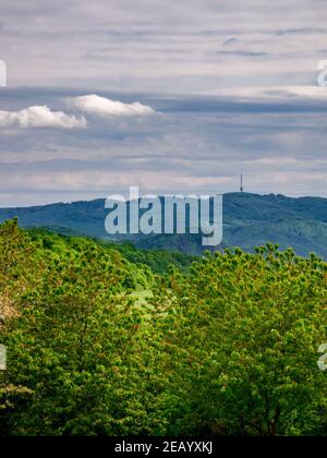 The communications tower with hills in the background at sunset Stock ...