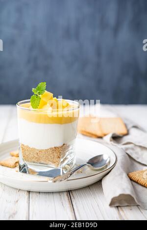 Pineapple and pineapple slices on an old wooden background Stock Photo ...