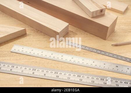 Group of assorted Wood material with professional rulers. Carpentry ...