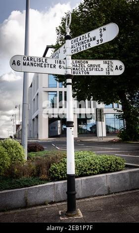 Old cast iron mileage signpost, Oldham, Lancashire,England UK Stock ...
