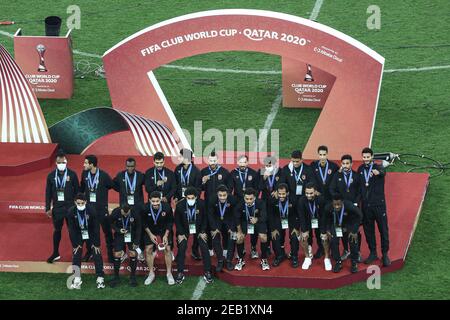Ar Rayyan, Qatar. 11th Feb, 2021. Al Ahly's Ayaman Ashraf (R) and ...