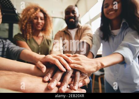 People of different ethnicities uniting to cooperate together Stock ...