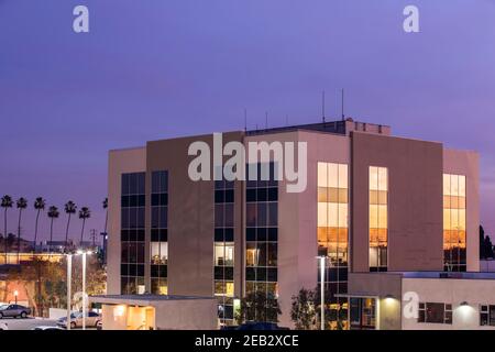Twilight view of the downtown skyline of Downey, California, USA Stock ...
