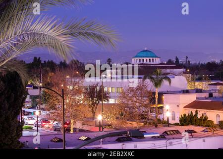 Twilight view of the downtown skyline of Downey, California, USA Stock ...