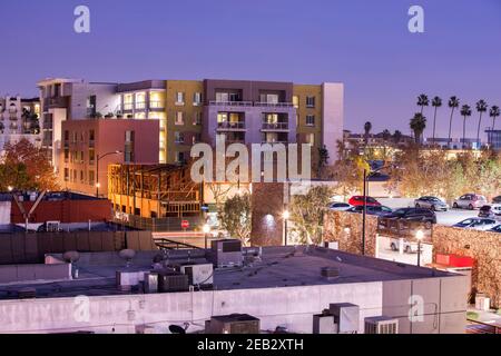 Twilight view of the downtown skyline of Downey, California, USA Stock ...