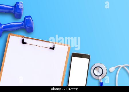 Medical form with blue dumbbell, white towel, measuring tape and red ...