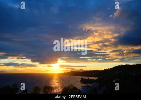 sunset with colorful sky and clouds, Skiathos , Greece Stock Photo - Alamy