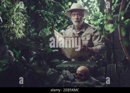 Scared explorer walking in the jungle and finding a human skull, she is ...