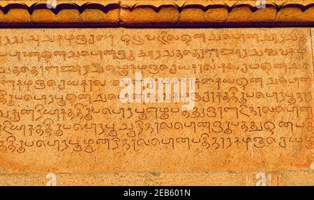 Stone Inscriptions of Tamil language carved on the exterior stone walls ...