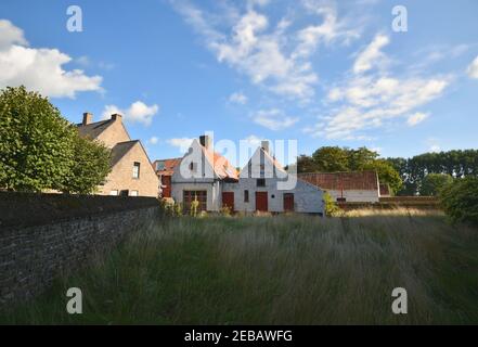 Typical Flemish rural houses in the countryside of Damme, a picturesque ...
