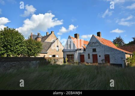 Typical Flemish rural houses in the countryside of Damme, a picturesque ...