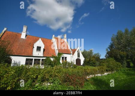 Typical Flemish rural houses in the countryside of Damme, a picturesque ...
