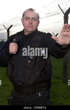 UK Police Officer using Incapacitant Spray Stock Photo - Alamy