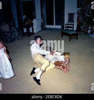 President John F. Kennedy (partially hidden), First Lady Jacqueline ...