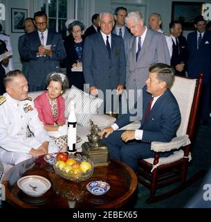Navy vice admiral William Raborn, Jr., poses with President Kennedy ...