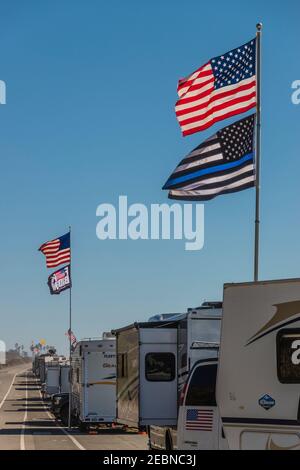 American flags lined up at an outdoor public picnic area Stock Photo ...