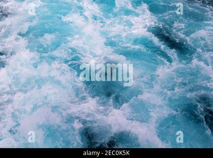 The seawater ship trail with a white foamy wave Stock Photo - Alamy