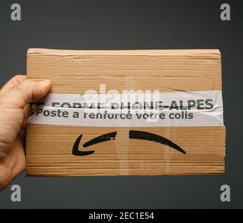 A crushed and damaged Amazon box Stock Photo - Alamy
