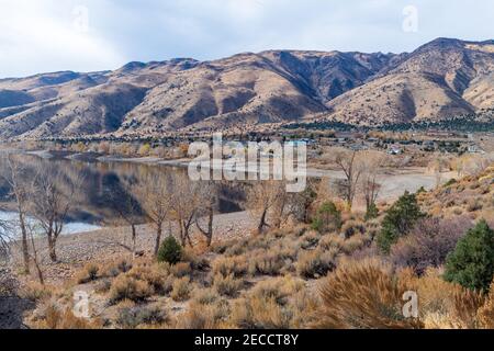 Hills reflecting in Topaz Lake on the border of Nevada and California ...