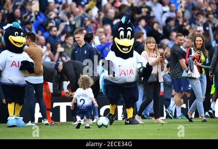 Tottenham Hotspur club mascot Chirpy Cockerel (centre) and the Chelsea ...