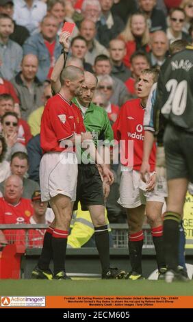 Manchester United's Roy Keane is shown the red card by referee Uriah ...