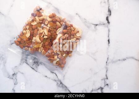 packet of mixed nuts on table Stock Photo - Alamy