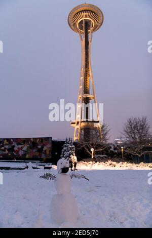 Seattle, USA. 13th Feb, 2021. Mid-day a Snowman at the Seattle Center ...