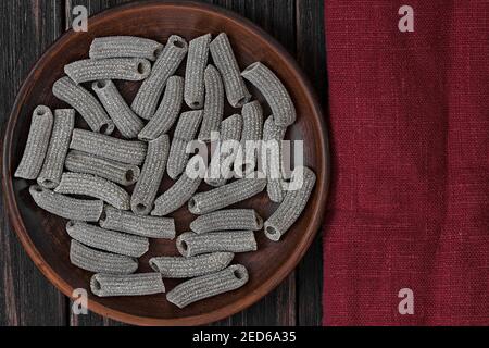 selective focus photo of uncooked hemp pasta. close-up of nutritious ...