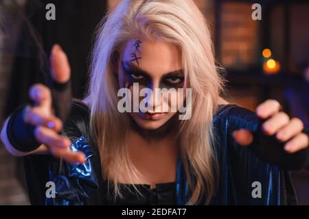 Witch performing black magic ritual Stock Photo - Alamy