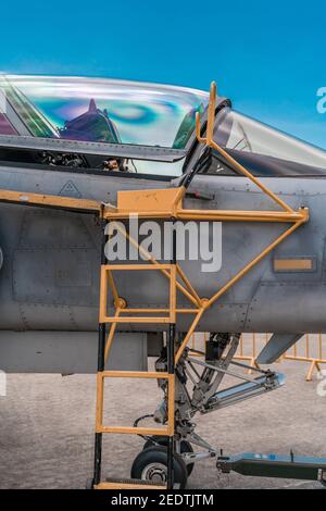 Cockpit of a powerful gray-colored military fighter jet under the ...