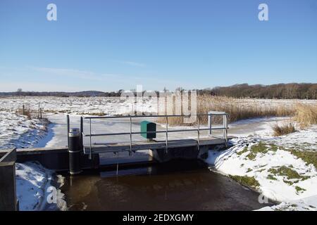 Very small Dutch weir (Dutch: klepstuw) in a ditch. The weir regulates ...