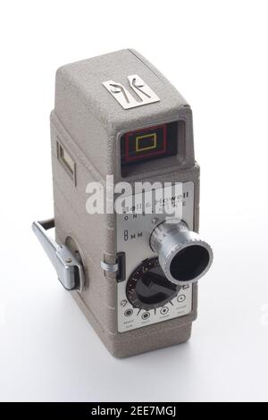 old 8mm movie camera on white background. Old 8mm camera Stock Photo ...