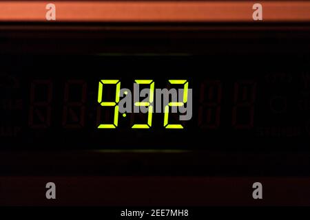 Digital alarm clock on green grass, on nature background Stock Photo ...