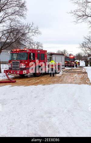 Fire engine pumper hooked to fire hydrant at house fire, Detroit ...