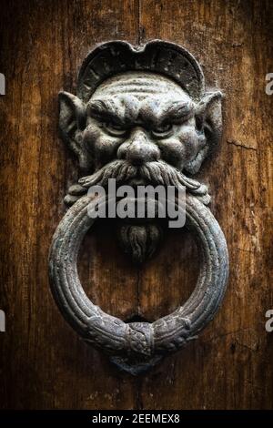 Wrought iron handle used for knocking. Typical handles of the medieval ...