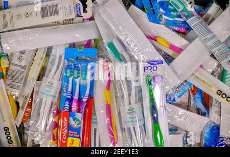 A crate of toothbrushes in plastic packaging donated to a Trussell ...