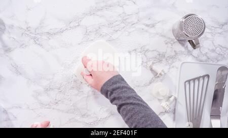 Flat lay. Step by step. Cutting out shapes from sugar cookie dough with ...