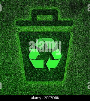 Recycling sign with dustbin on green background Stock Photo - Alamy