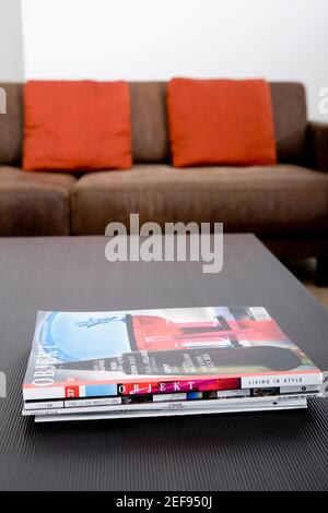 Stack of magazines on table, close up Stock Photo - Alamy