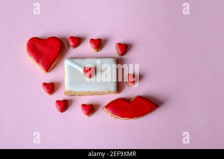 Envelope and many small hearts on red background with space for text ...