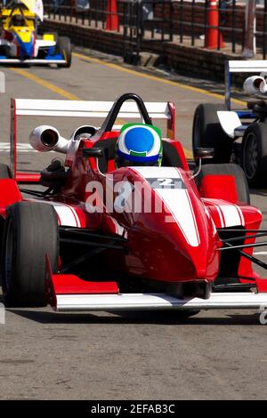 two racecars on the track Stock Photo - Alamy